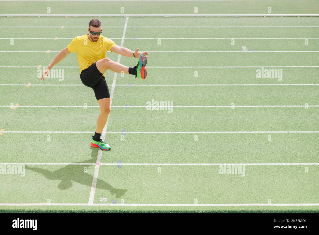 Athlete stretching leg hi-res stock photography and images - Alamy