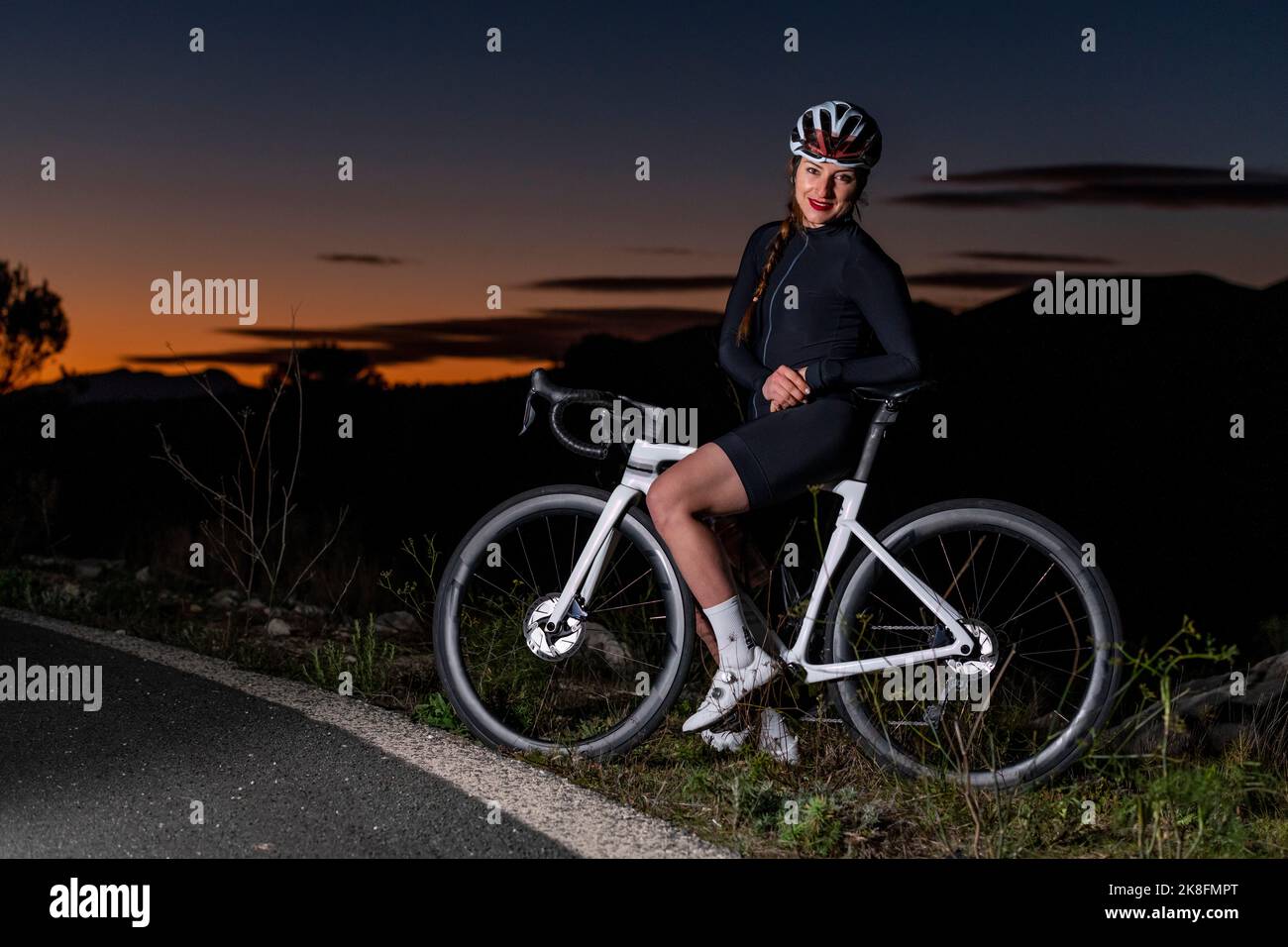 Dusk cyclist hi-res stock photography and images - Alamy