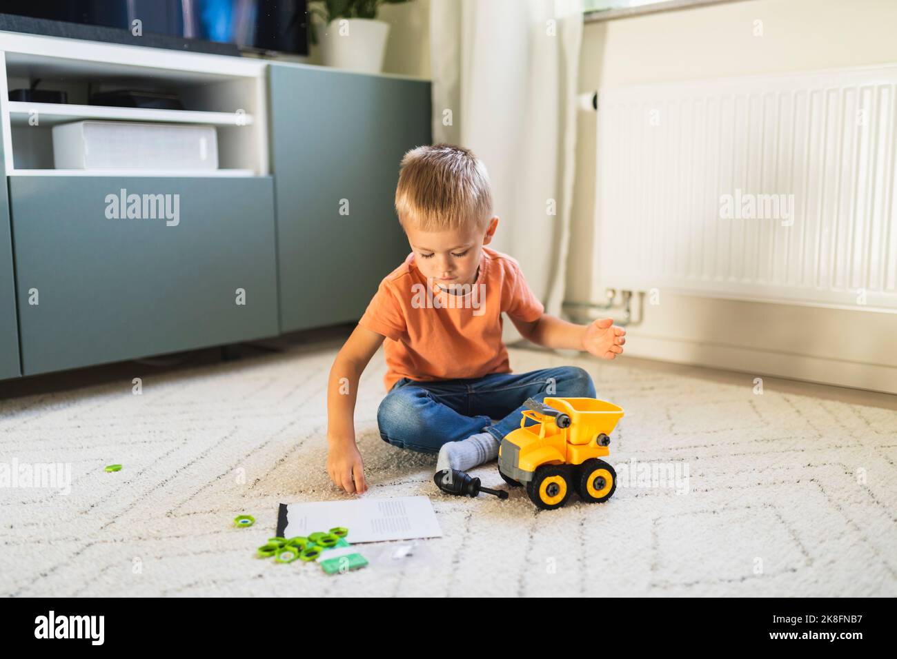 Children playing toys cross hi-res stock photography and images - Alamy