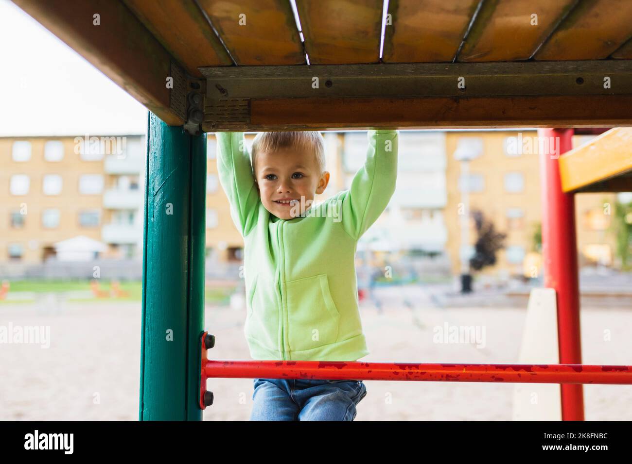 Cute boy playing in park Stock Photo - Alamy