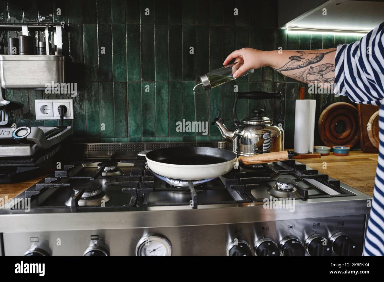 Cooking oil pouring in pan hi-res stock photography and images - Alamy