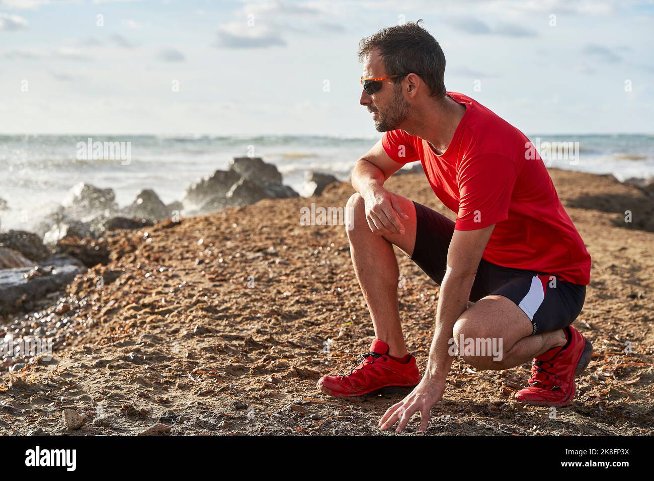 Man wearing sunglasses on beach hi-res stock photography and images - Alamy