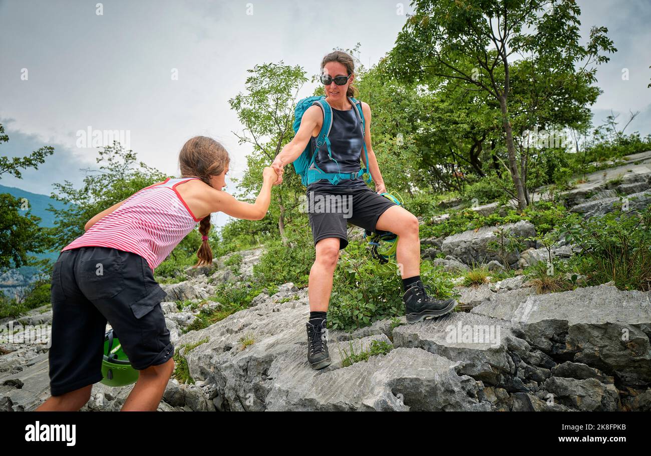Helping hand mountain climbing hi-res stock photography and images - Alamy