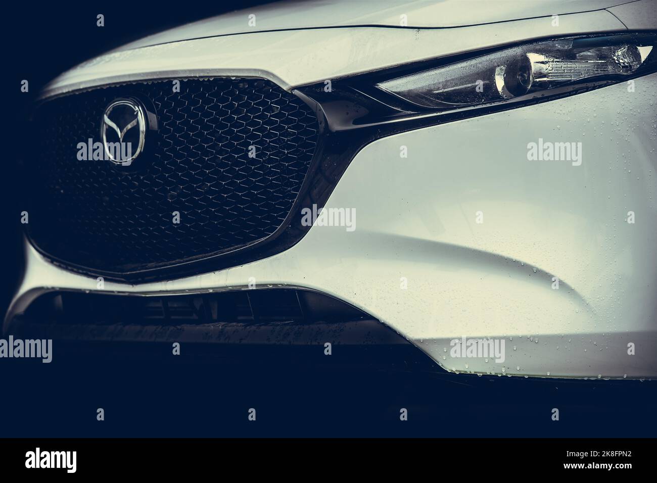 Mazda 3 with rain drops Stock Photo - Alamy