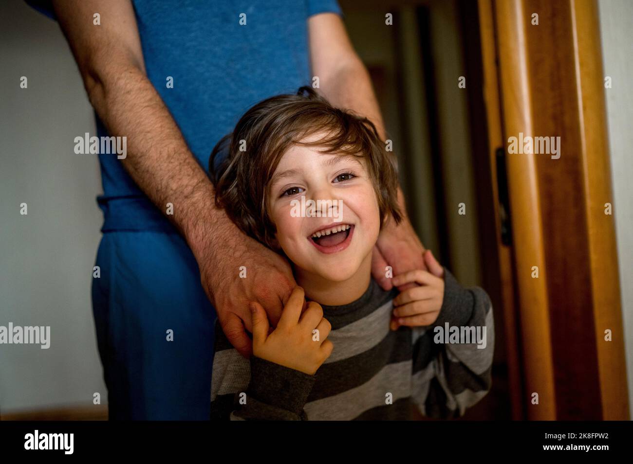 Hand on sons shoulder hi-res stock photography and images - Alamy