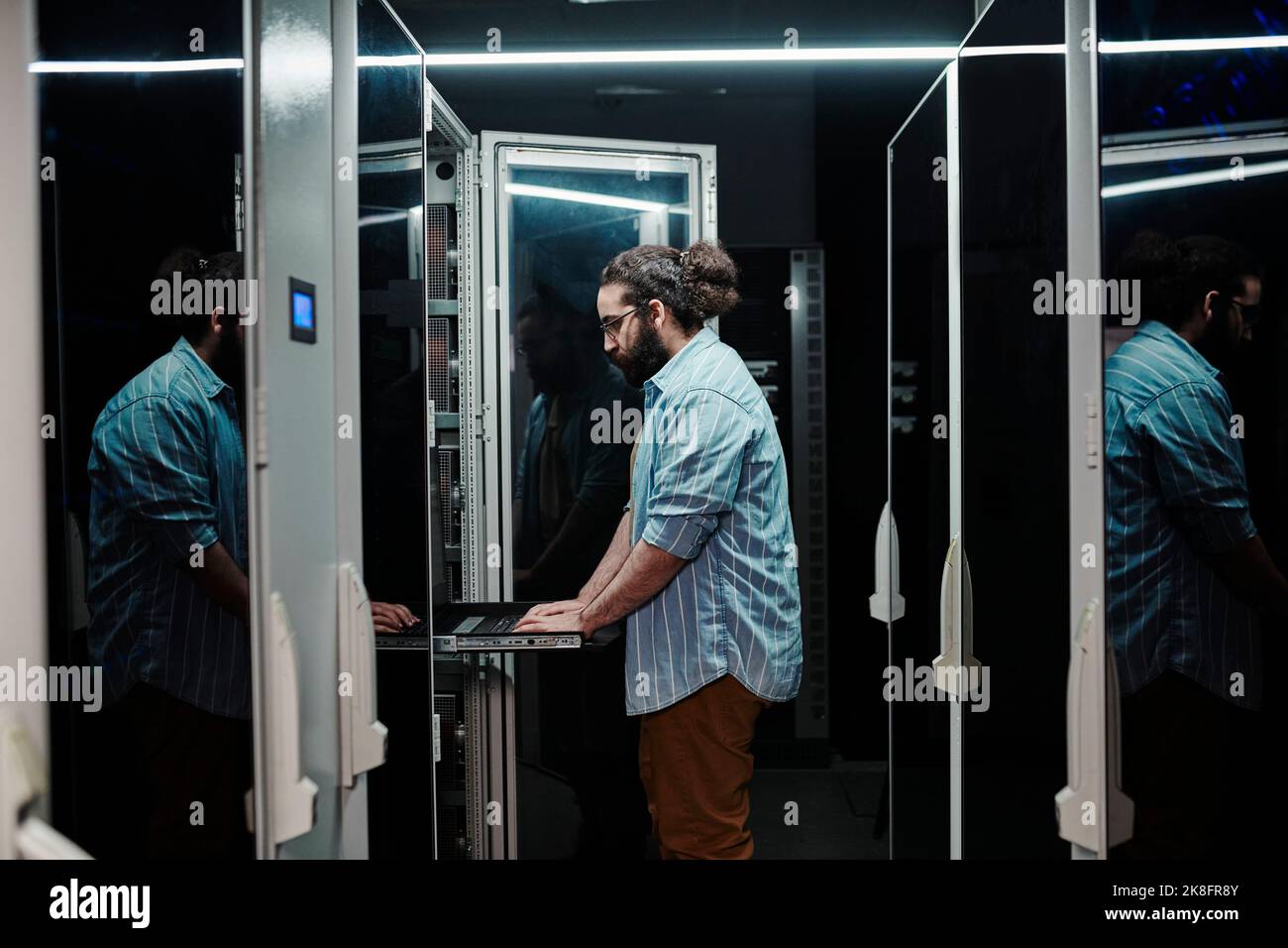 Technology control room standing communication expertise hi-res stock ...