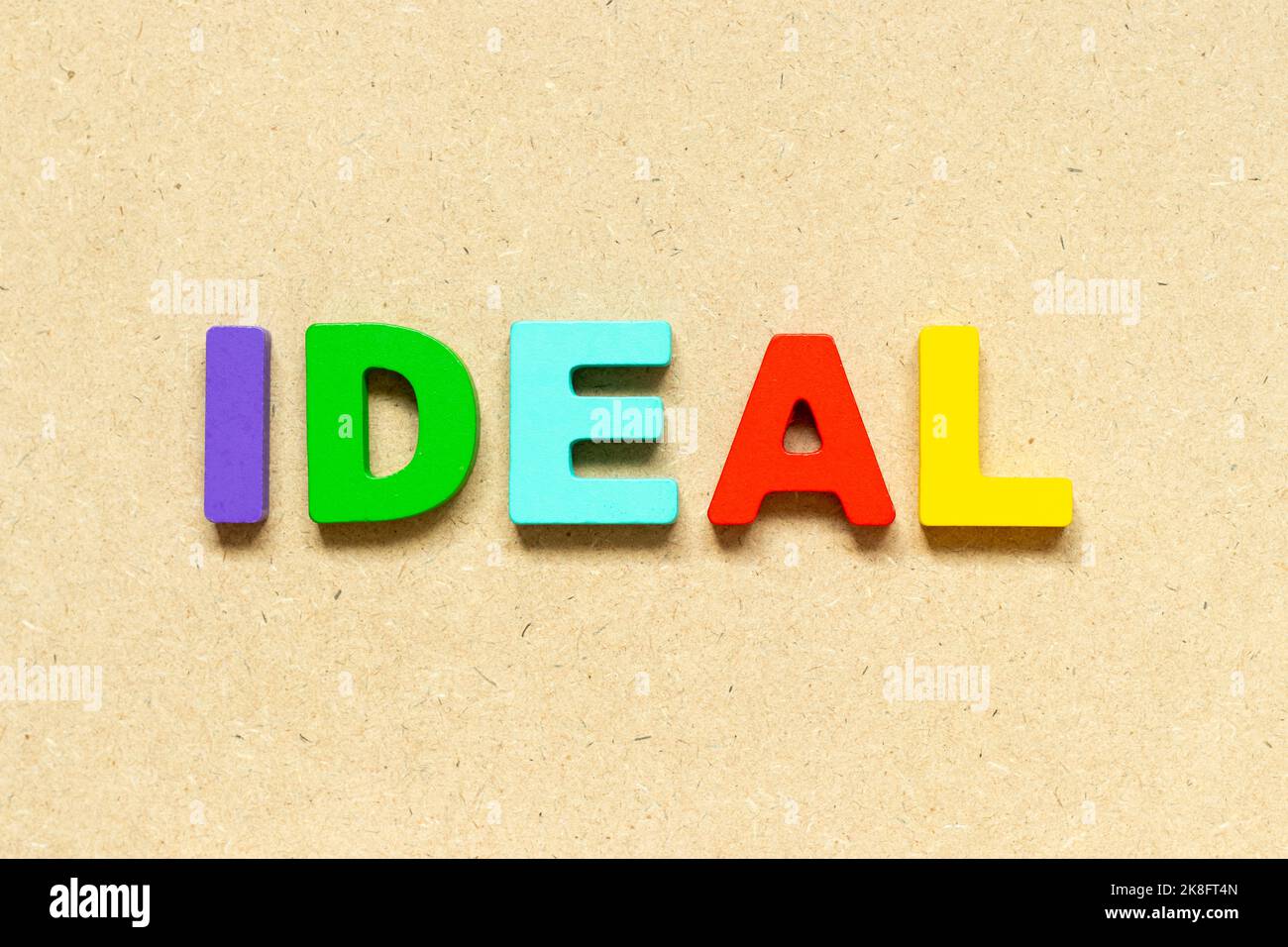 Color alphabet letter with word ideal on wood background Stock Photo ...
