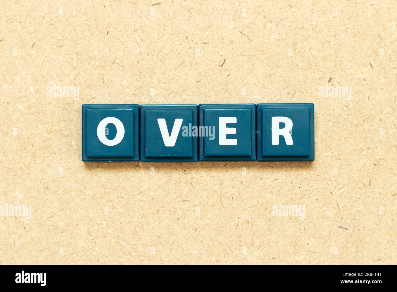 Tile alphabet letter in word over on wood background Stock Photo - Alamy