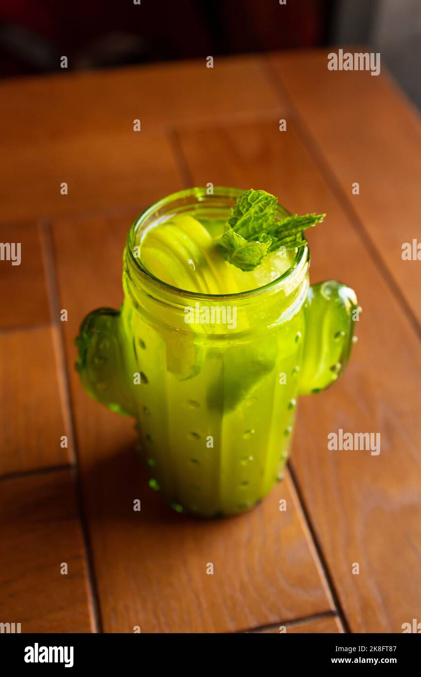 Ice tea with lime slices, alcoholic drink, citrus lemonade, cocktail in ...