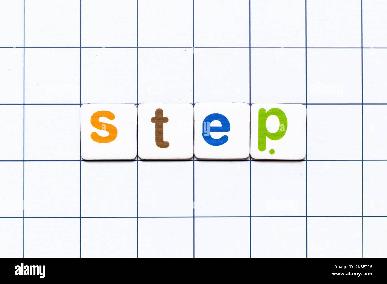 Colorful tile letter in word step on white grid background Stock Photo ...
