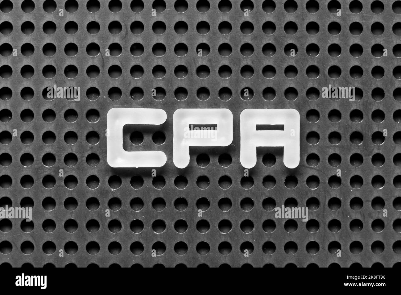 White alphabet letter in word CPA (Abbreviation of Cost per click or ...