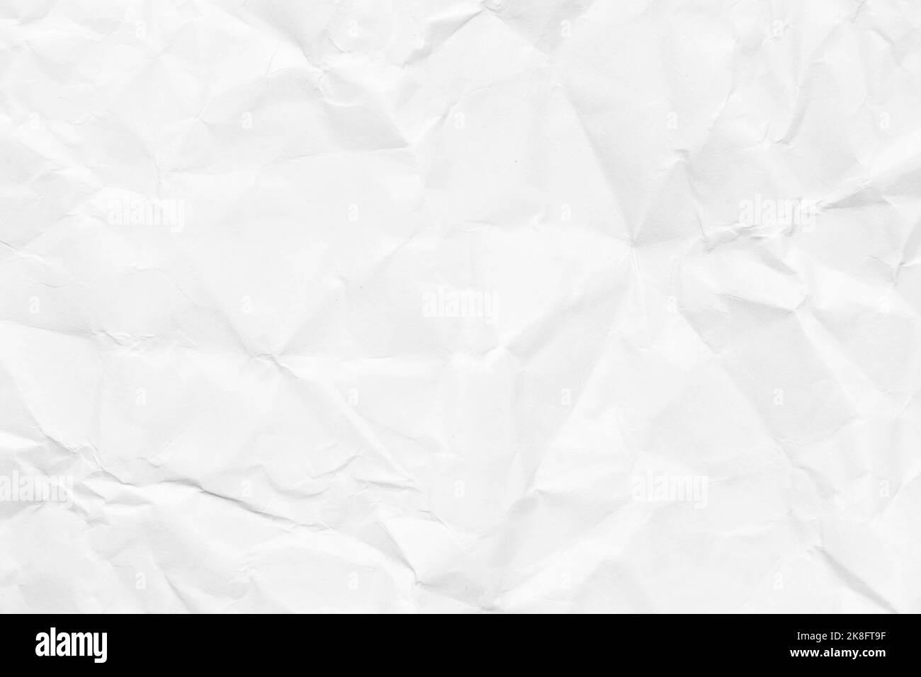 Grunge wrinkled white color paper textured background with copy space ...