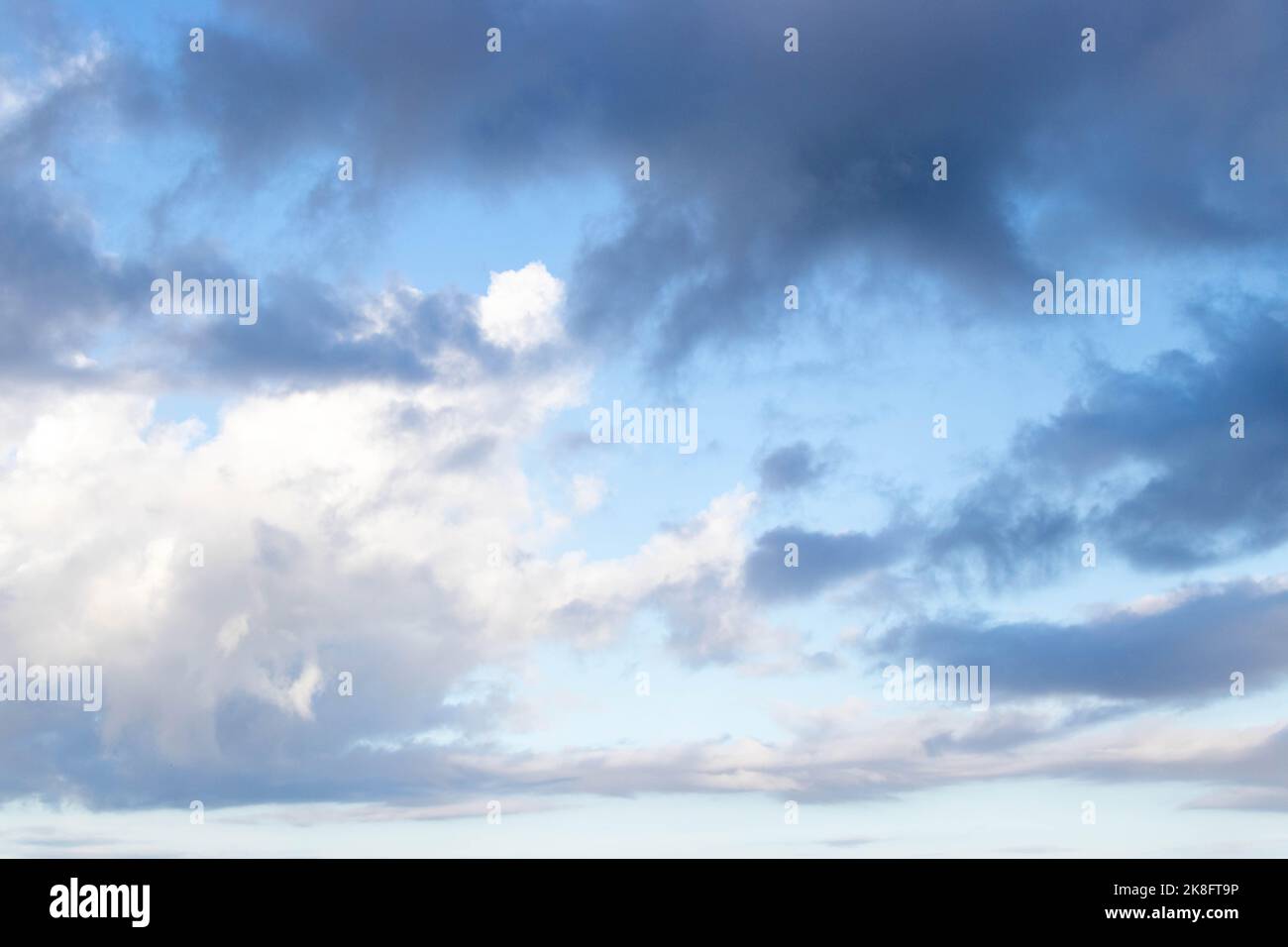 Blue color sky with white fluffy cloud background Stock Photo - Alamy