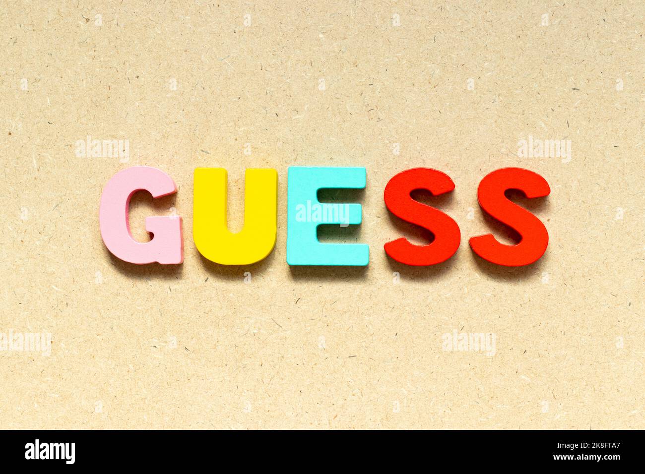 Color alphabet letter with word guess on wood background Stock Photo ...