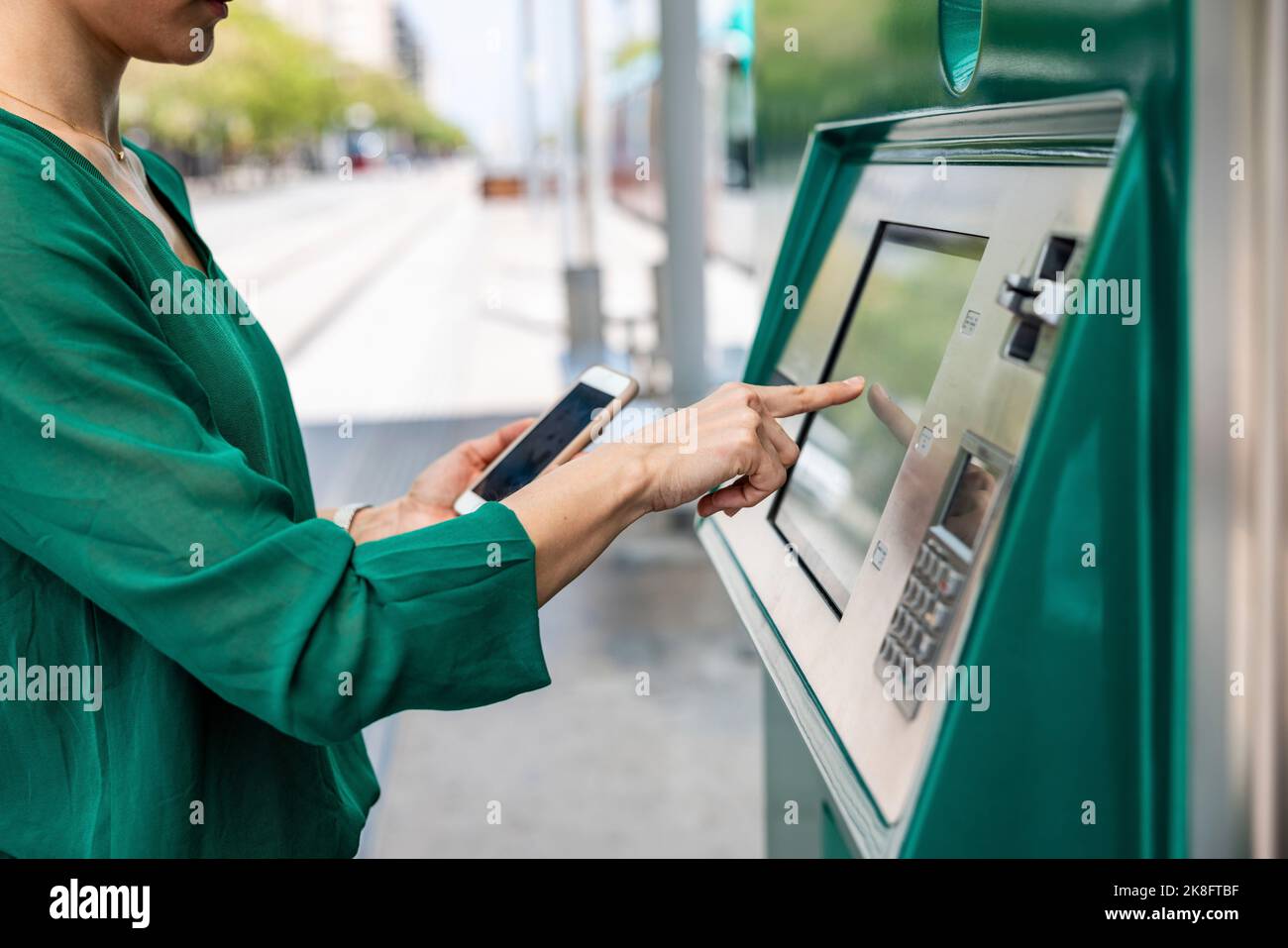 Person using ticket machine hi-res stock photography and images - Alamy