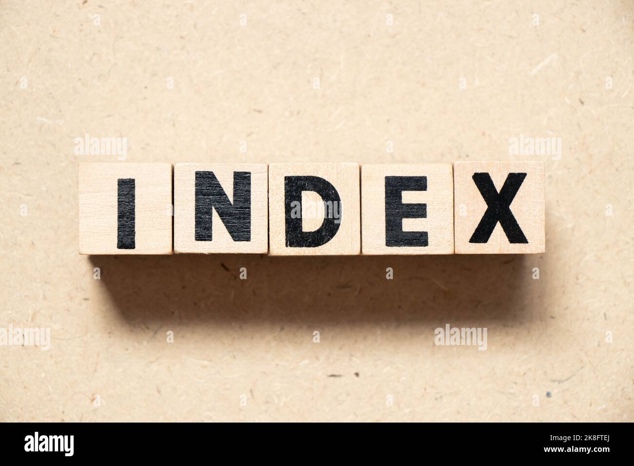 Alphabet letter block in word index on wood background Stock Photo - Alamy