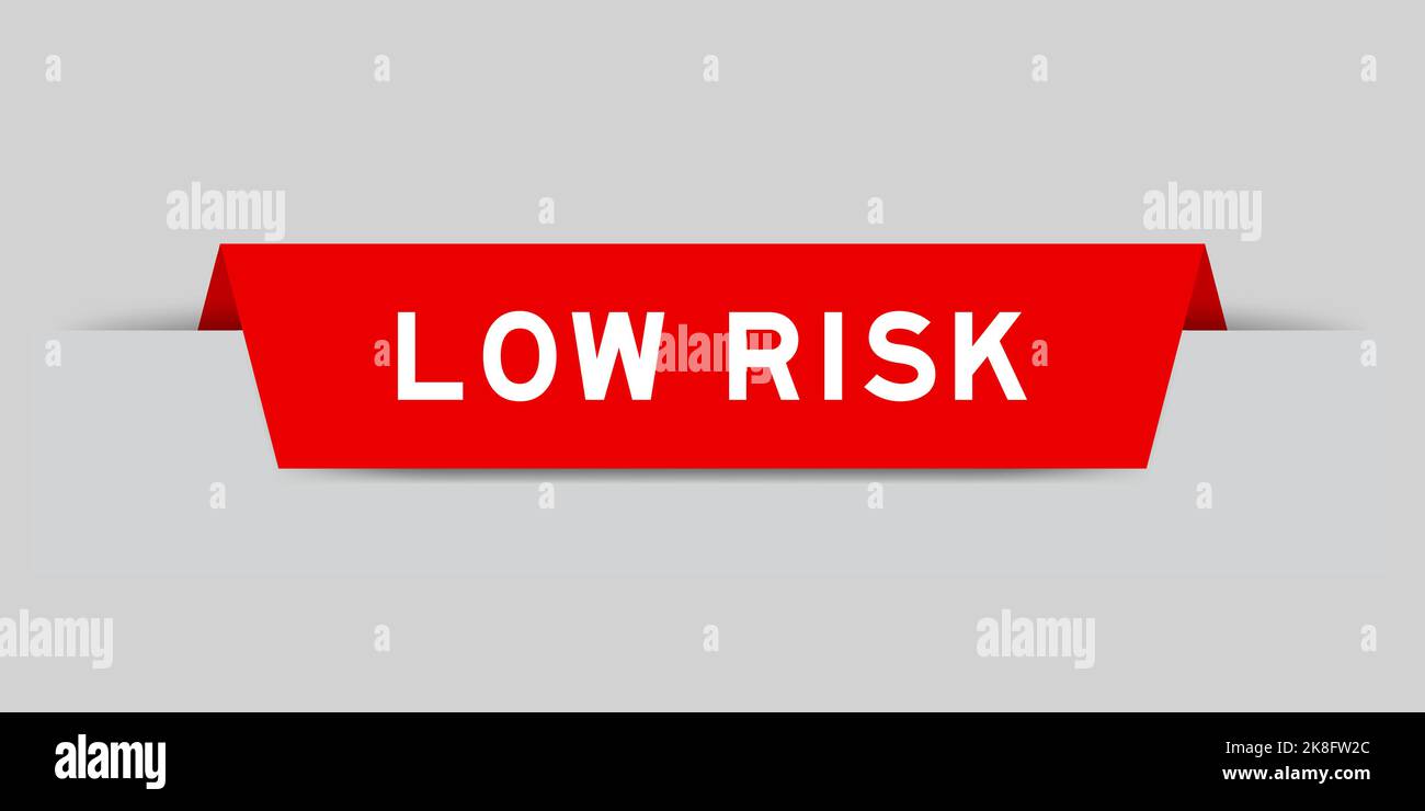 Red color inserted label with word low risk on gray background Stock ...