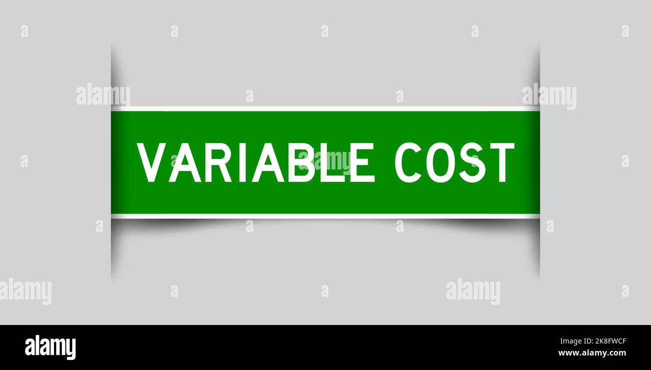 Inserted green color label sticker with word variable cost on gray ...
