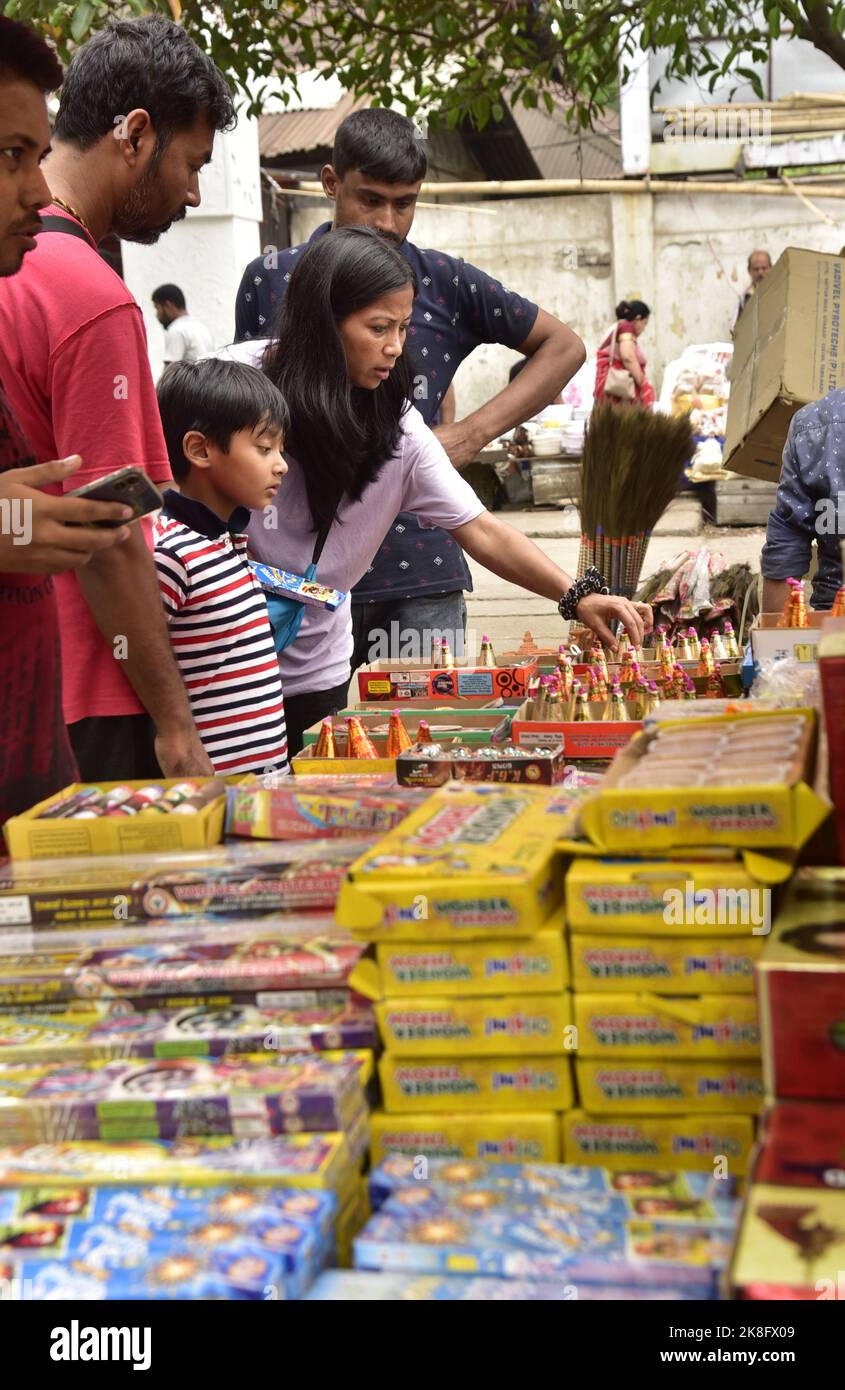 Guwahati, Guwahati, India. 23rd Oct, 2022. A woman buys fire crackers ...