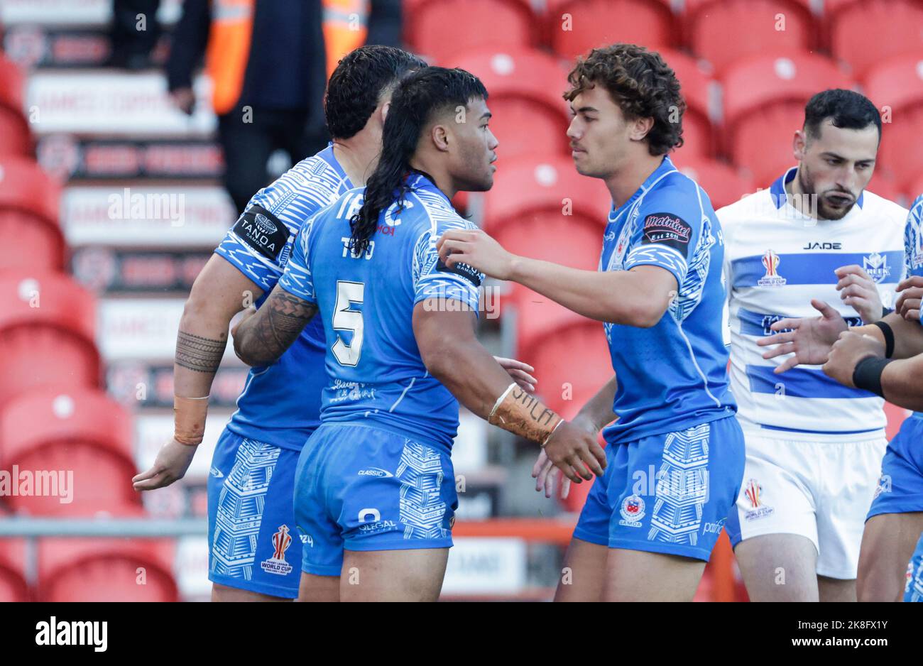 Samoa's Brian To’o (centre) celebrates scoring their side's first try ...