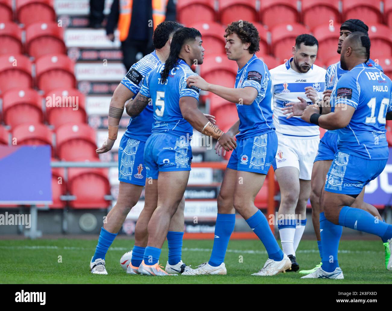Samoa's Brian To’o (centre) celebrates scoring their side's first try ...