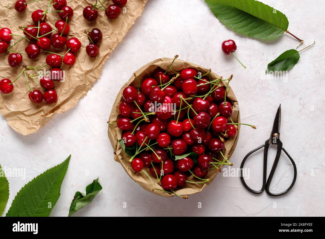 Summer cherries on the table, just picked. Top view Stock Photo - Alamy