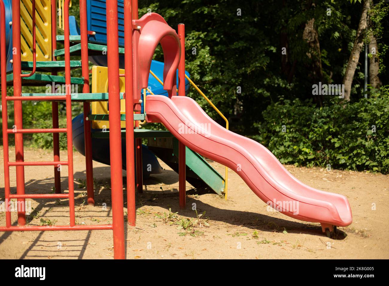 Children's playground in yard. Place for children to play. Carousels ...