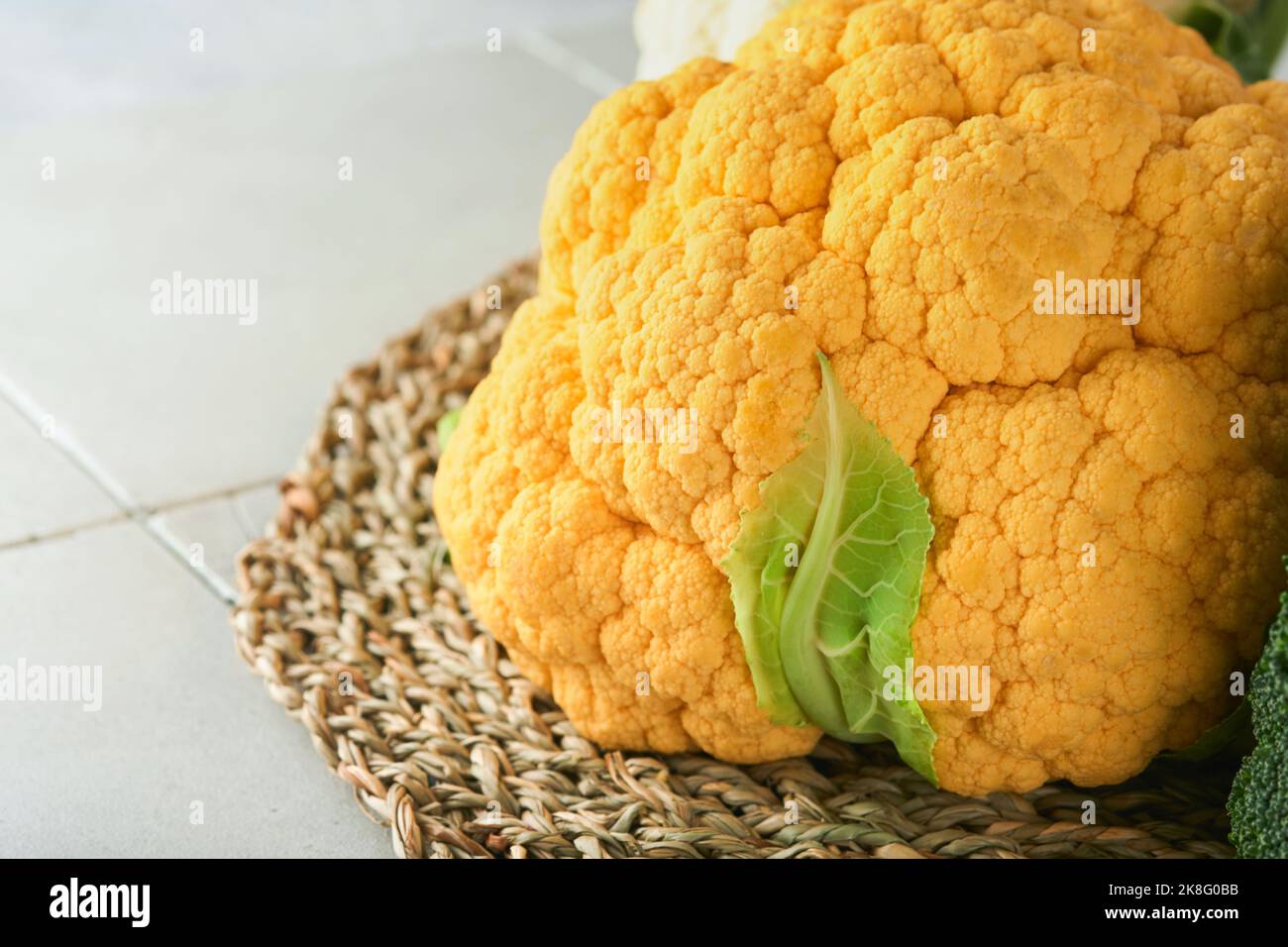 Colorfu cauliflower. Various sort of cauliflower on stone tiles gray ...