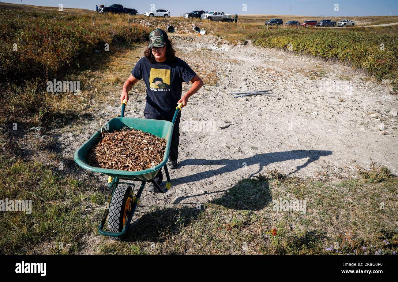 Jamison Russell, of the Blood Tribe Land Management department, wheels ...