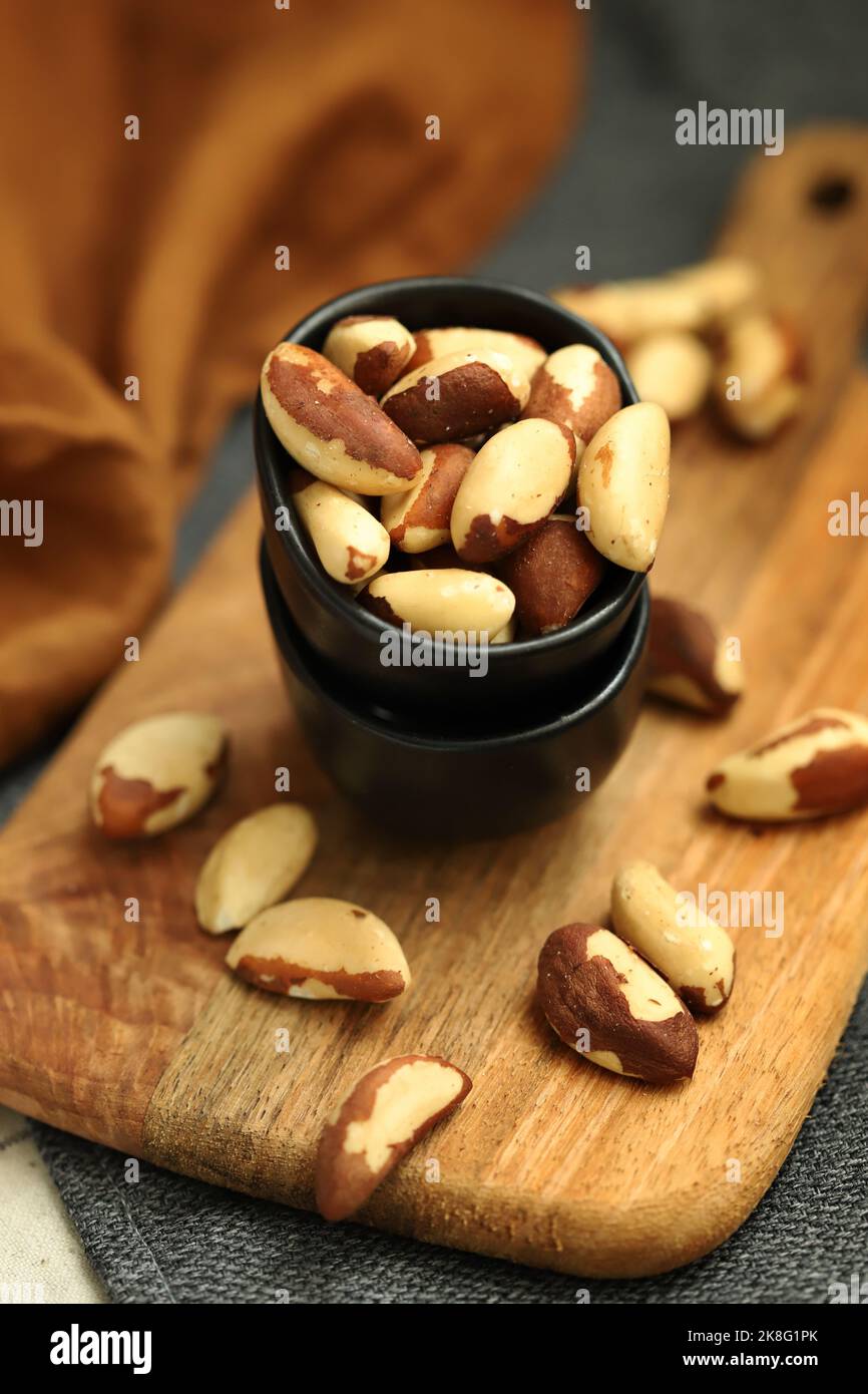 Macro. Large brazil nuts in a bowl. Peeled nuts Stock Photo - Alamy