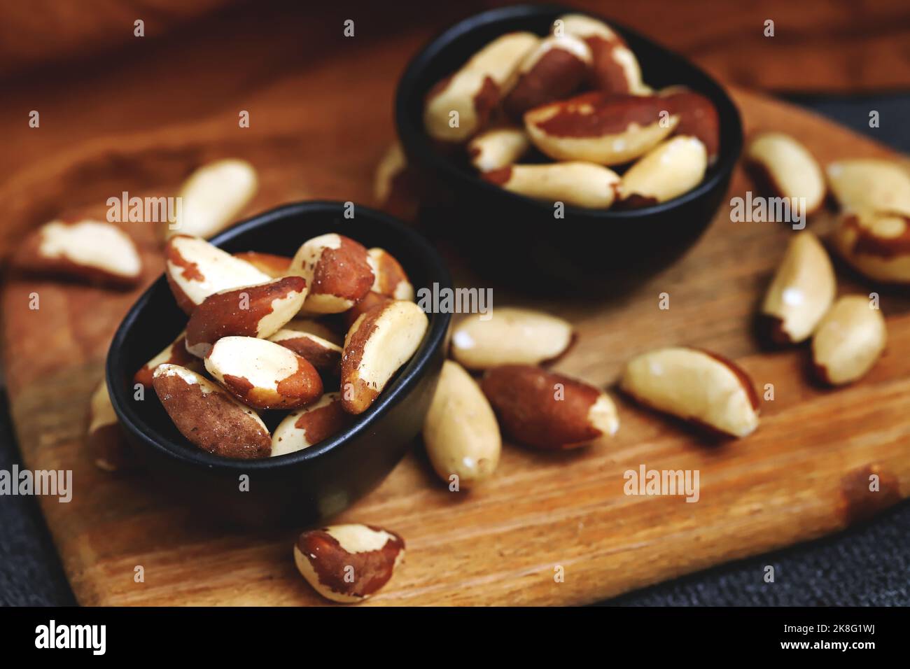Macro. Large brazil nuts in a bowl. Peeled nuts Stock Photo - Alamy
