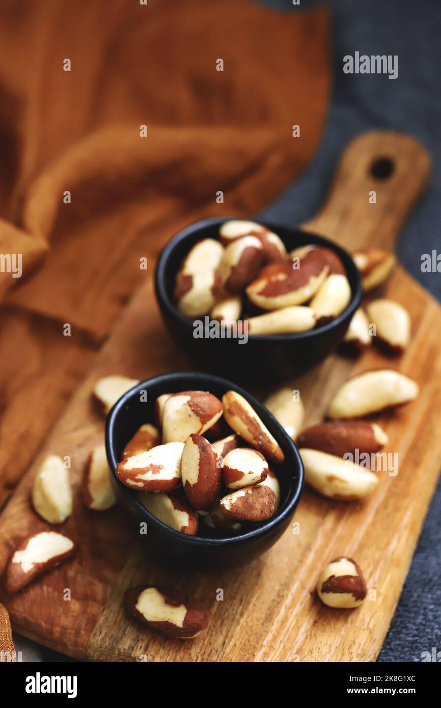 Macro. Large brazil nuts in a bowl. Peeled nuts Stock Photo - Alamy