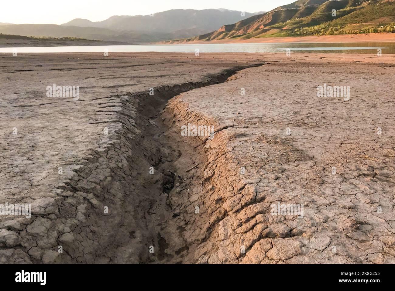Dry cracked earth. Drought. The dried-up bottom of the river. Landscape ...