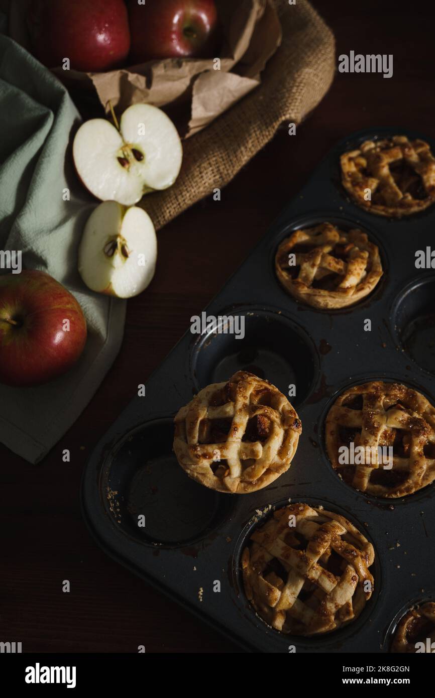 Mini Apple Pie Tarts in dark style food image Stock Photo - Alamy