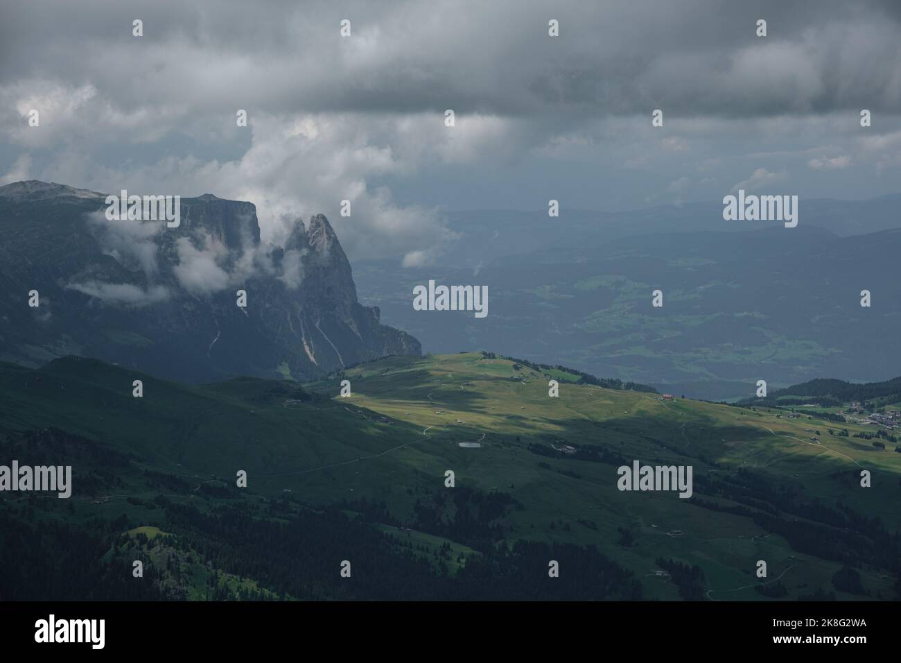 View to the Sciliar massif with the characteristic silhouette and Alpe ...