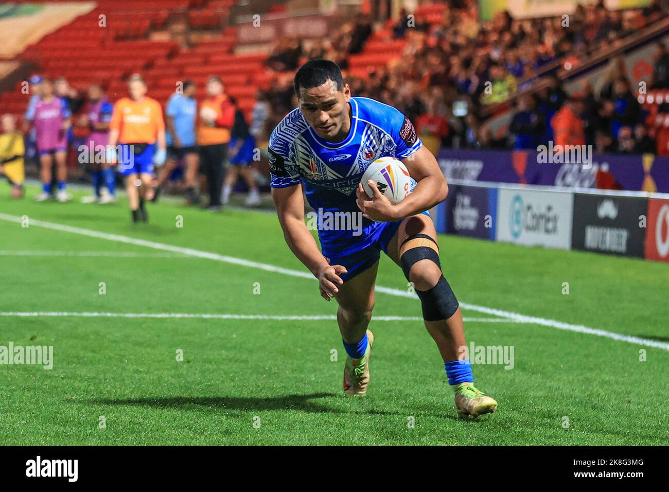 Mat Feagai of Samoa goes over for a try during the Rugby League World ...