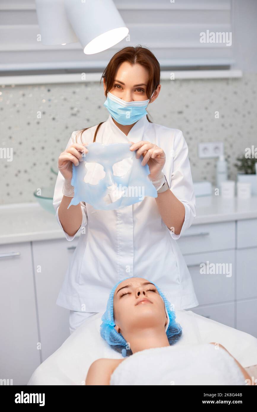 Removing mask hi-res stock photography and images - Alamy