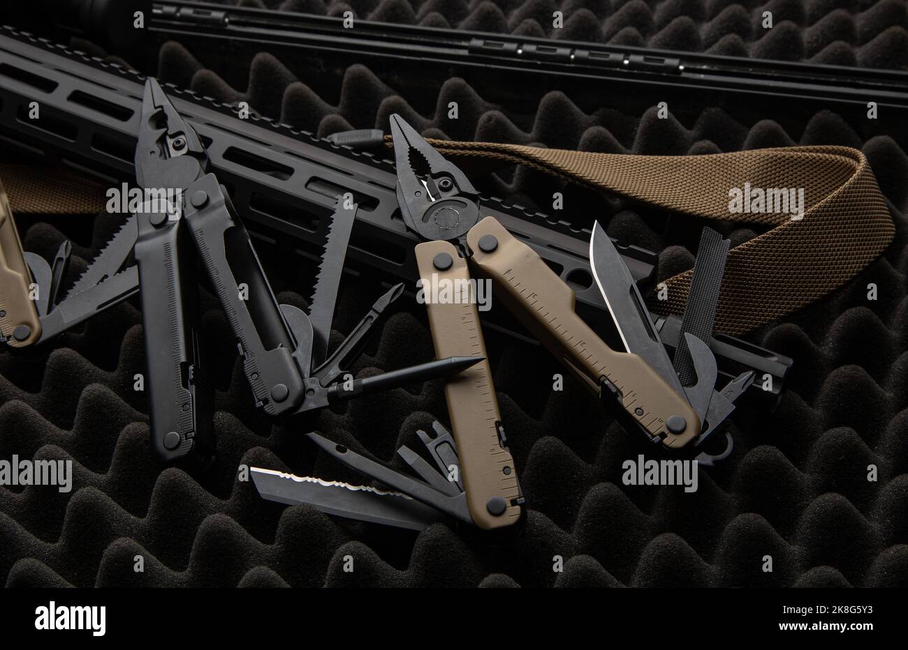Modern multitool with many tools. A portable multi-tasking military ...