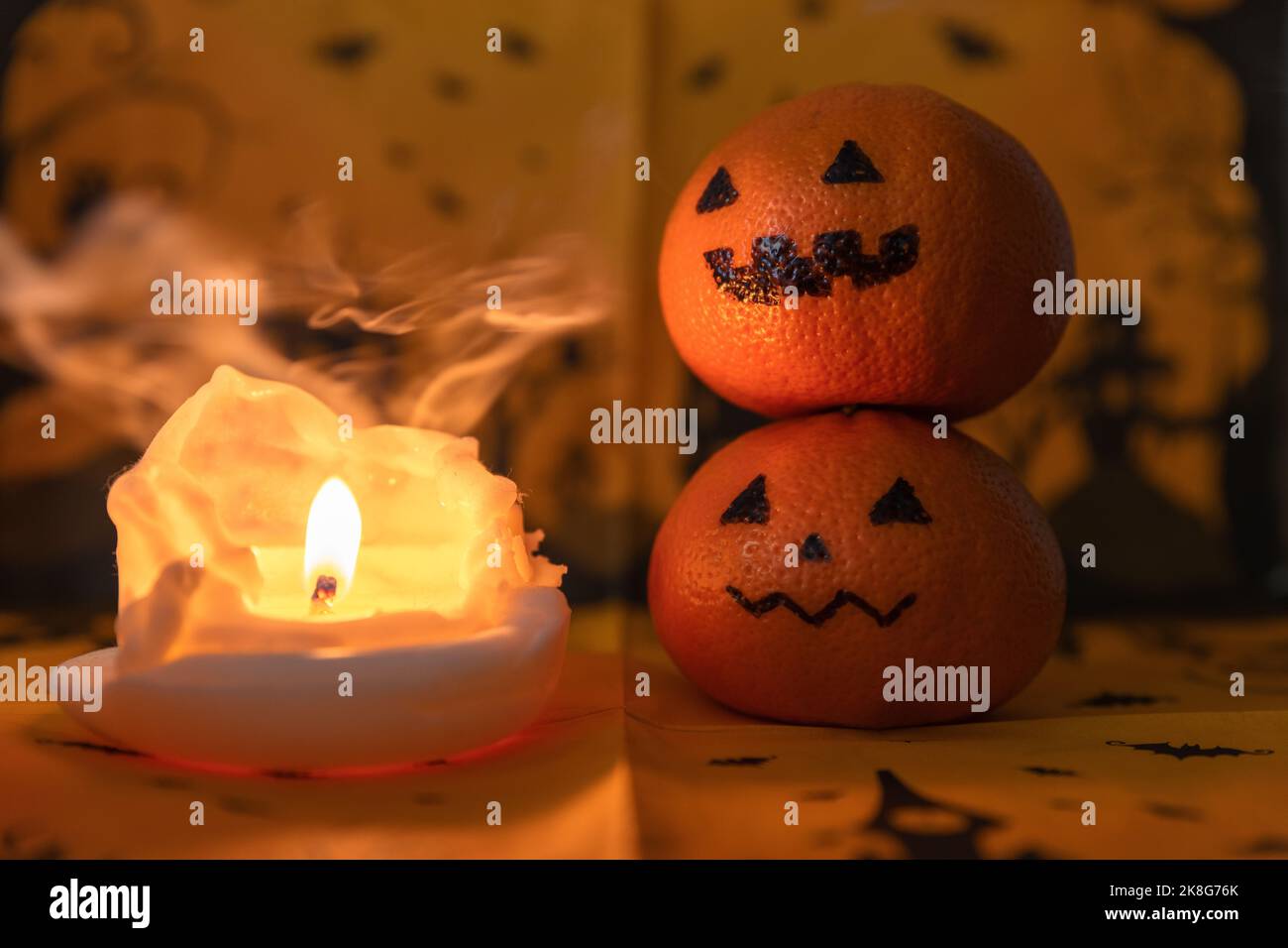 Mandarines painted like a halloween pimpkin, happy halloween Stock ...