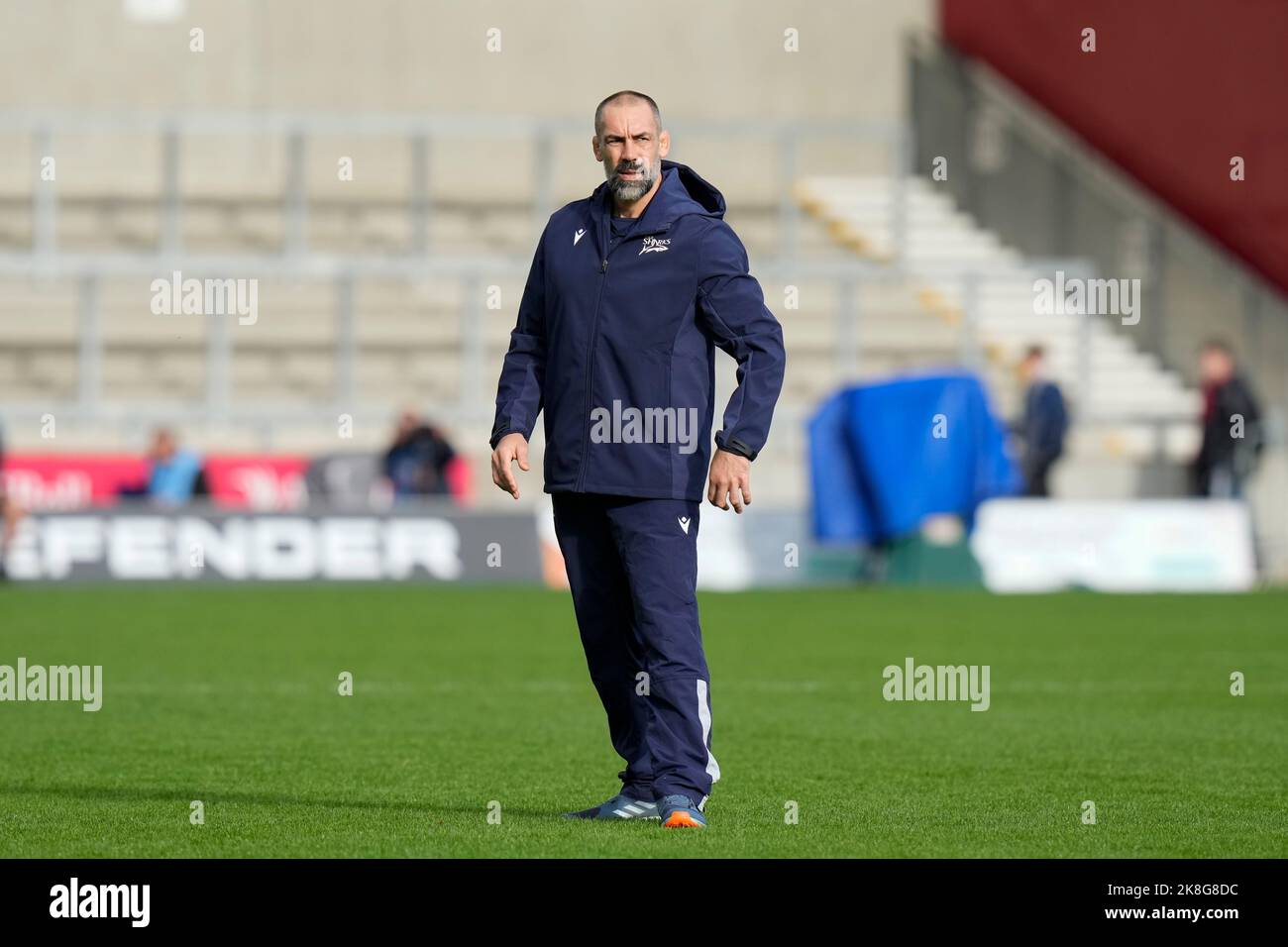 Alex Sanderson Director of Rugby of Sale Sharks watches his team warm ...
