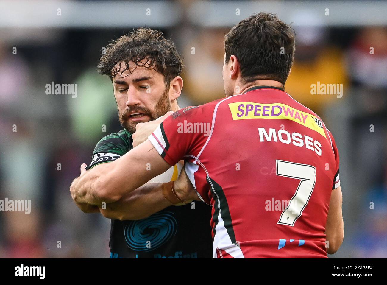 Toby King of Ireland is tackled by Mitchell Moses of Lebanon during the ...