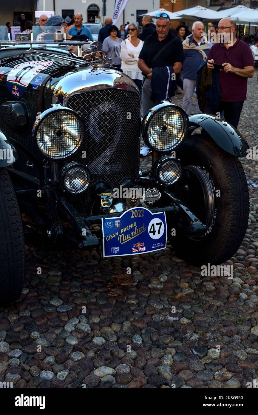 Old Bentley car surrounded by people watching it during the 2022 ...