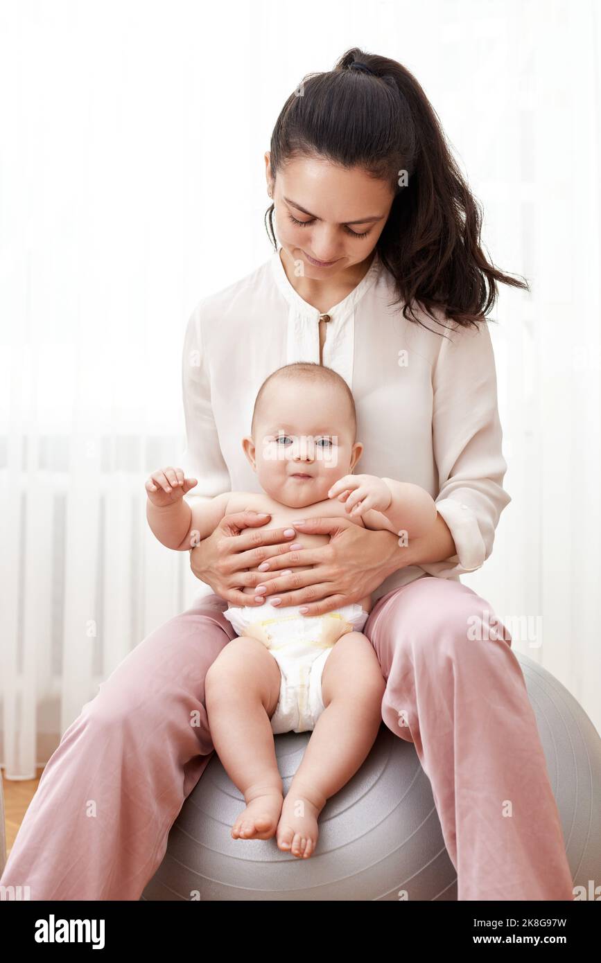 Playing ball baby parent hi-res stock photography and images - Alamy