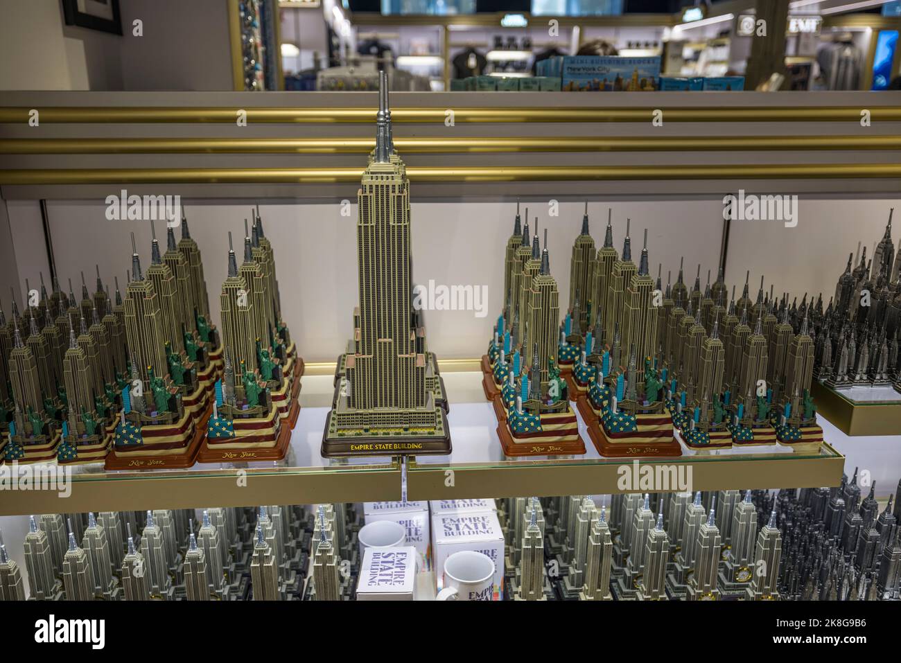 Close up view of souvenir shelf with small replica models of Empire ...
