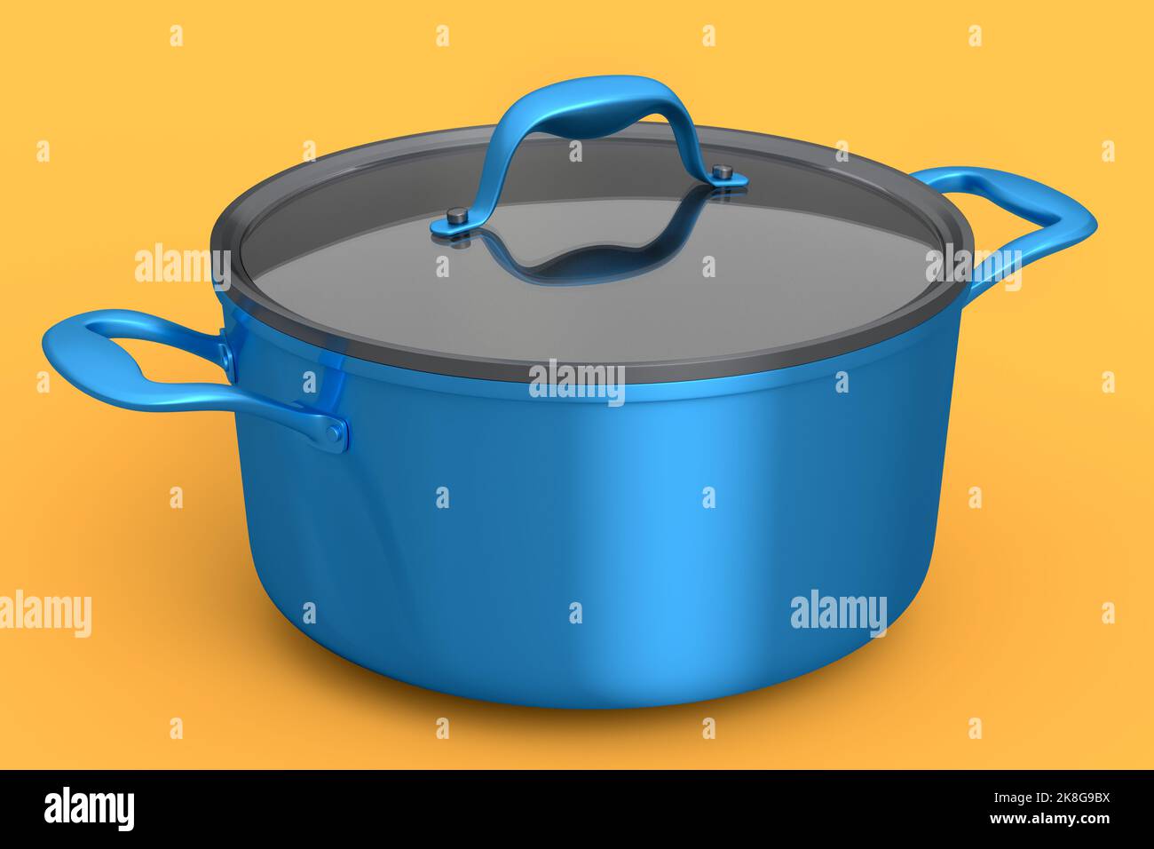 Stainless steel stewpot and chrome plated aluminum cookware on yellow ...