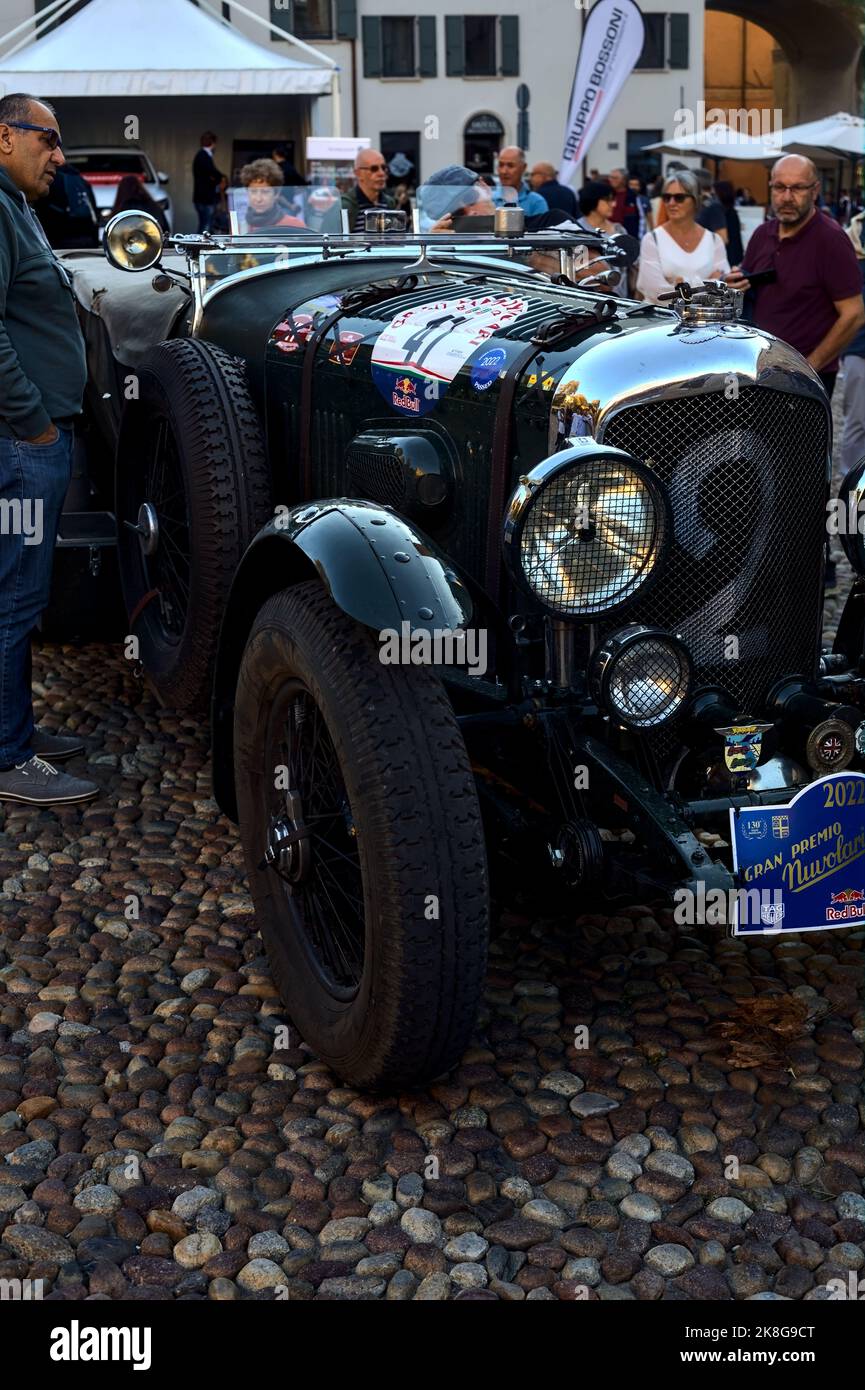 Old Bentley car surrounded by people watching it during the 2022 ...