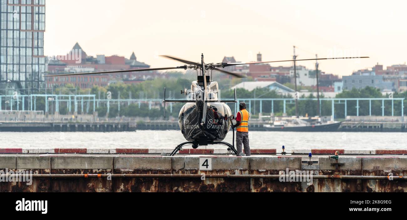 New York City, United States - September 19, 2022 An airfield worker ...
