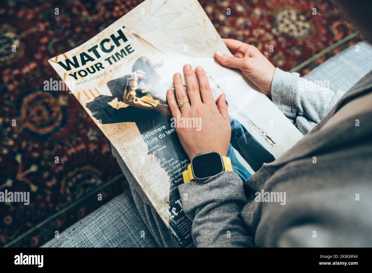 London, United Kingdom - Sept 28, 2022: Fashionable woman reading ...