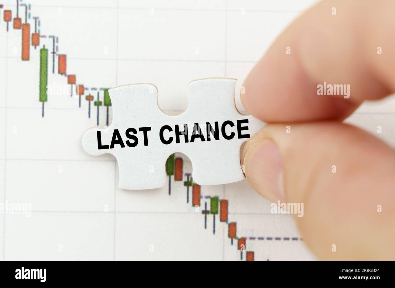 Business concept. Against the background of the quotes chart, a puzzle ...