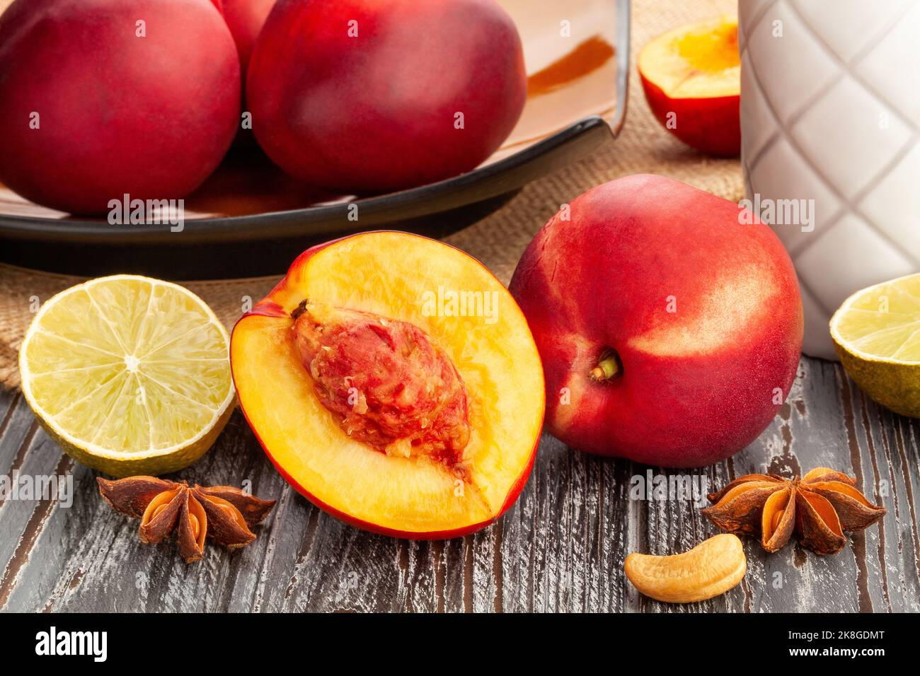 Sliced nectarine on wood hi-res stock photography and images - Alamy